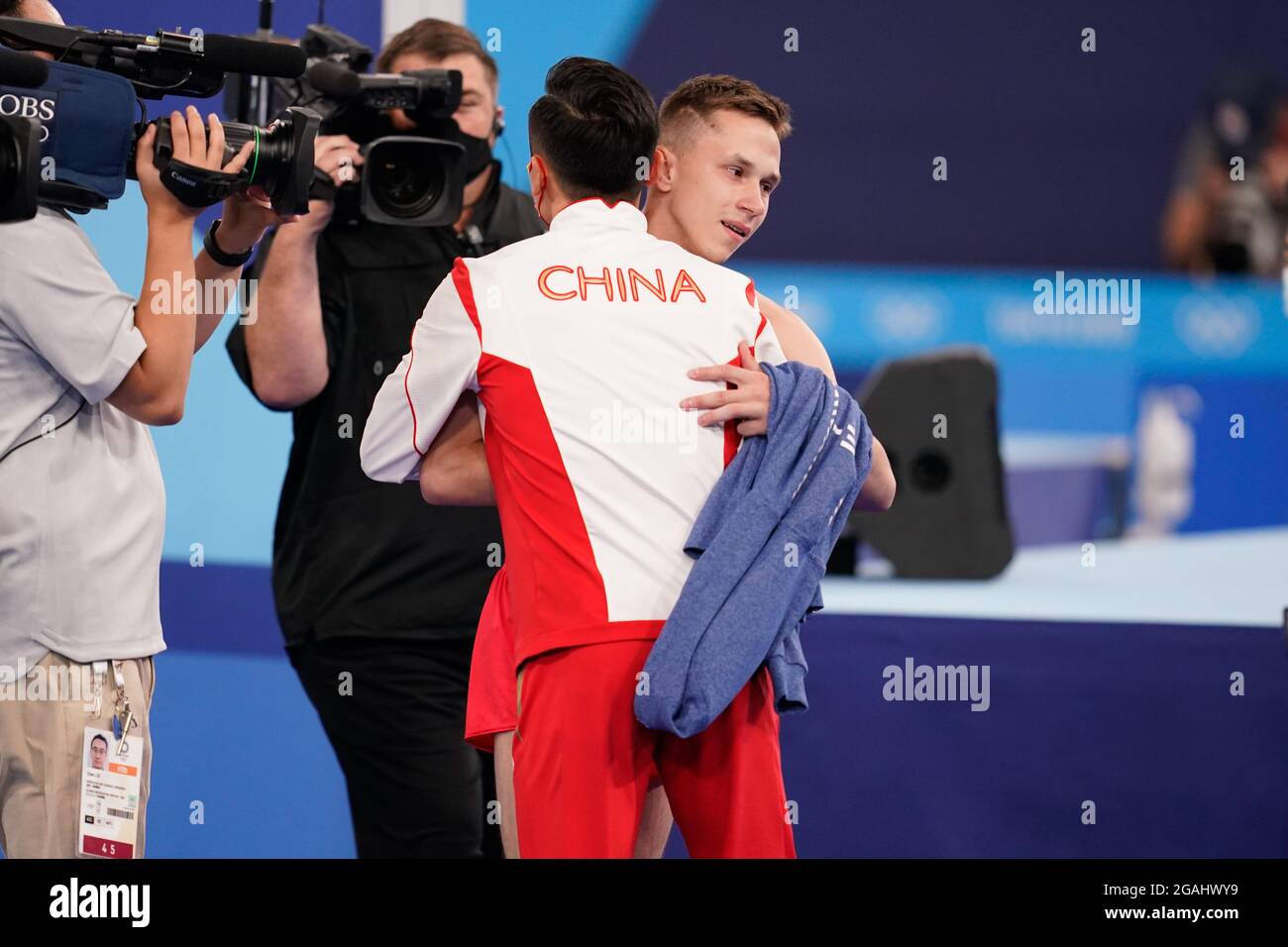 Tokyo, Japan. 31st July, 2021. (L-R) Dong Dong (CHN), Ivan Litvinovich ...