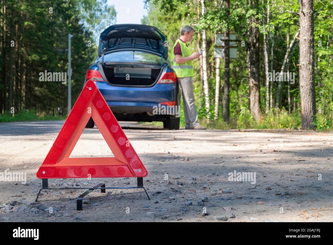 Triangular stop sign hi-res stock photography and images - Alamy