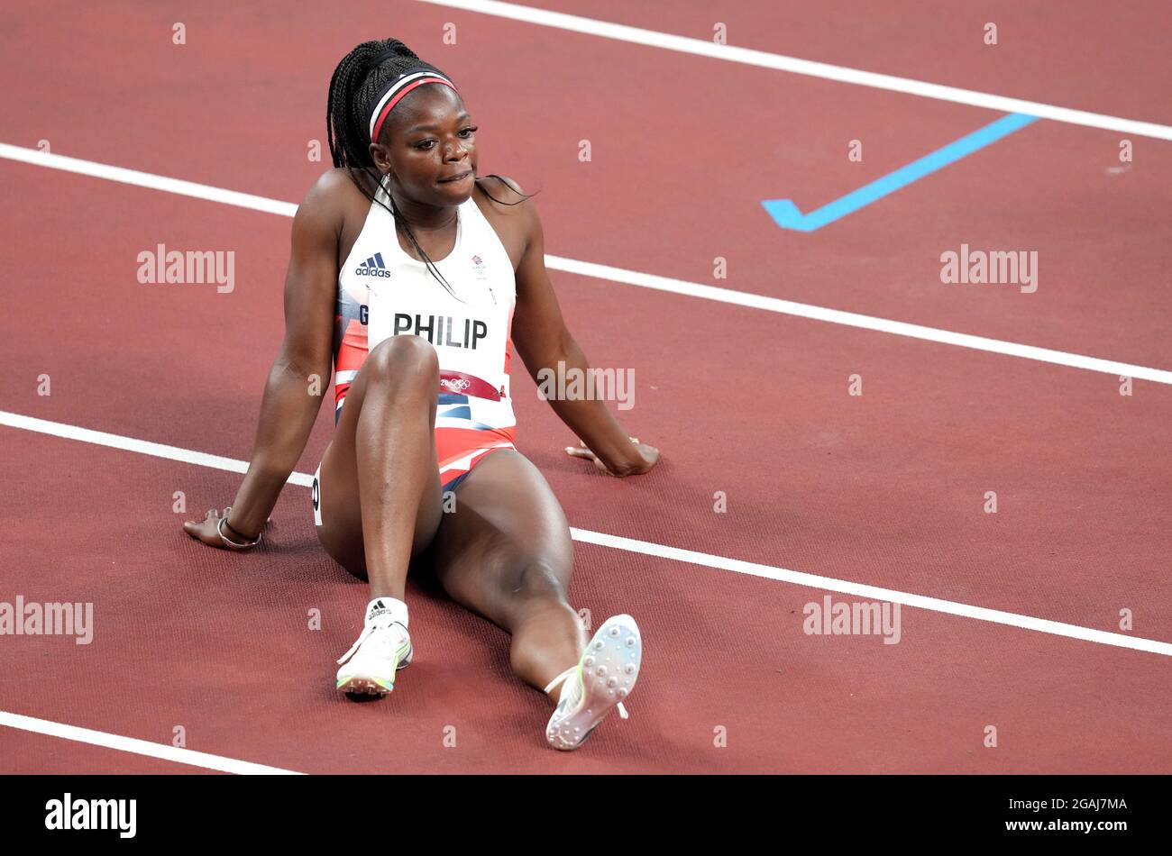 Great Britain's Asha Philip reacts after the Women's 100 metres second ...