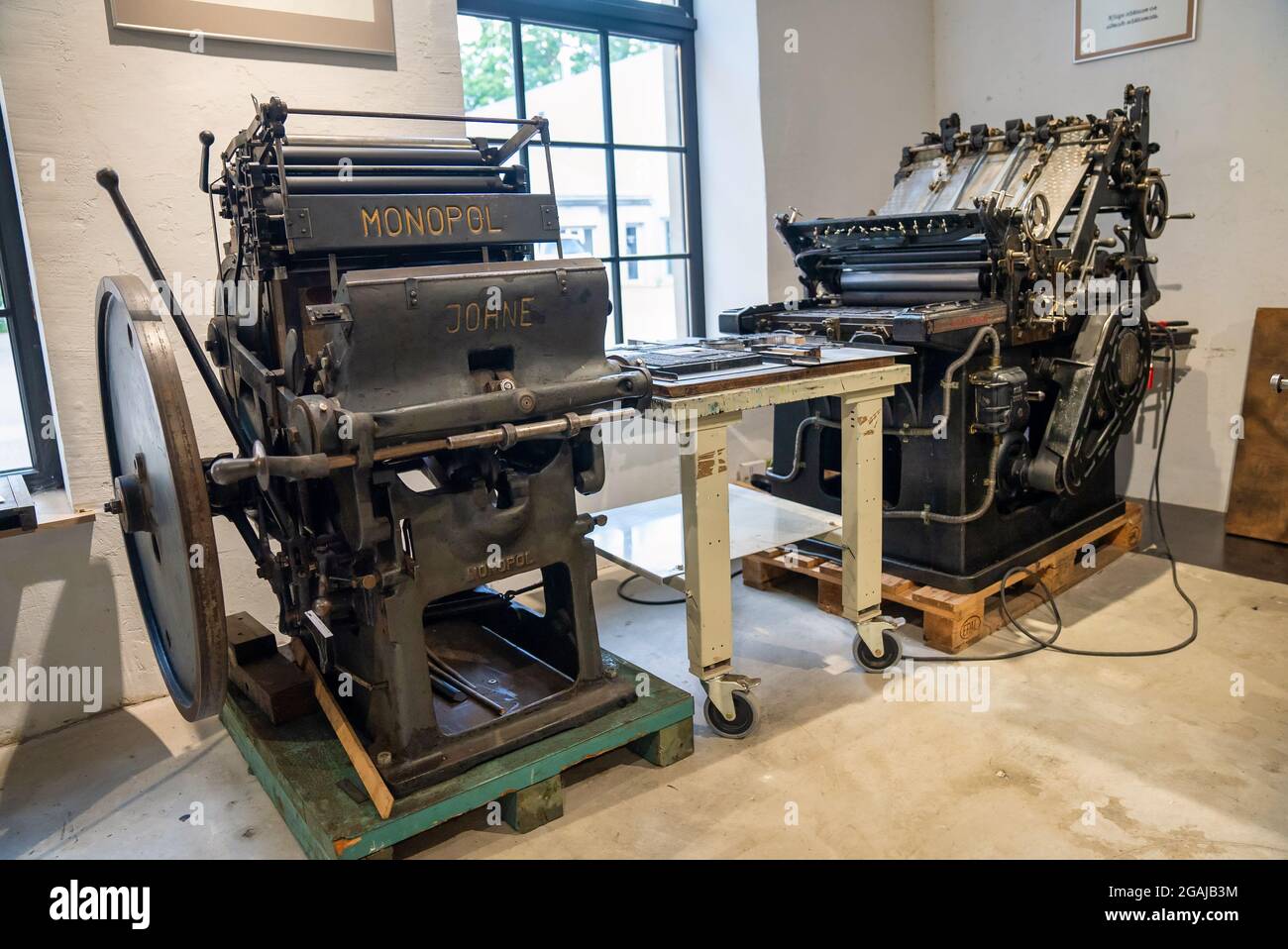 Old typography printing machine with letter samples Stock Photo - Alamy