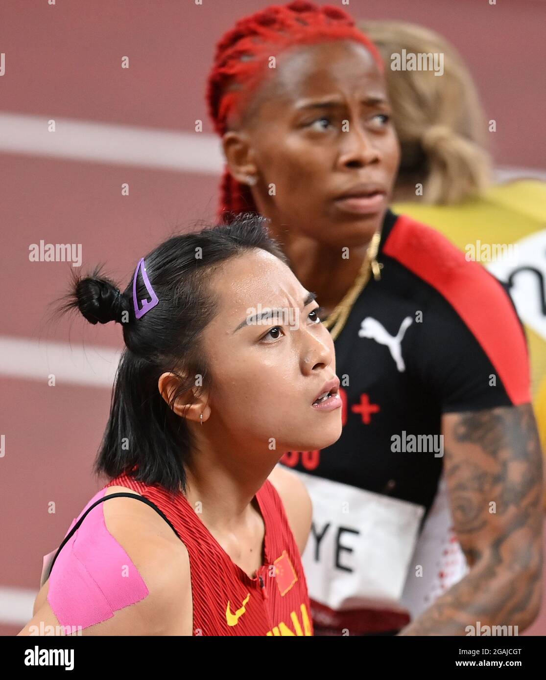 Tokyo, Japan. 31st July, 2021. Ge Manqi (down) of China reacts during ...