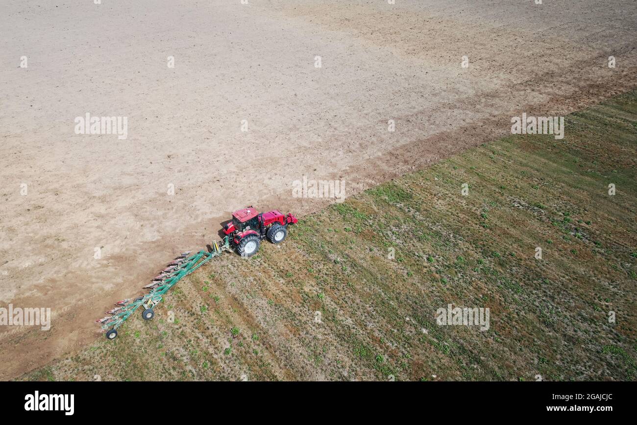 Farmer with plough above view hi-res stock photography and images - Alamy