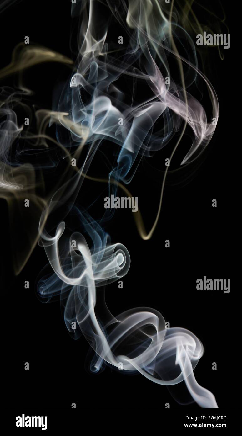 Vertical smoke curves shape flow on black isolated background Stock ...