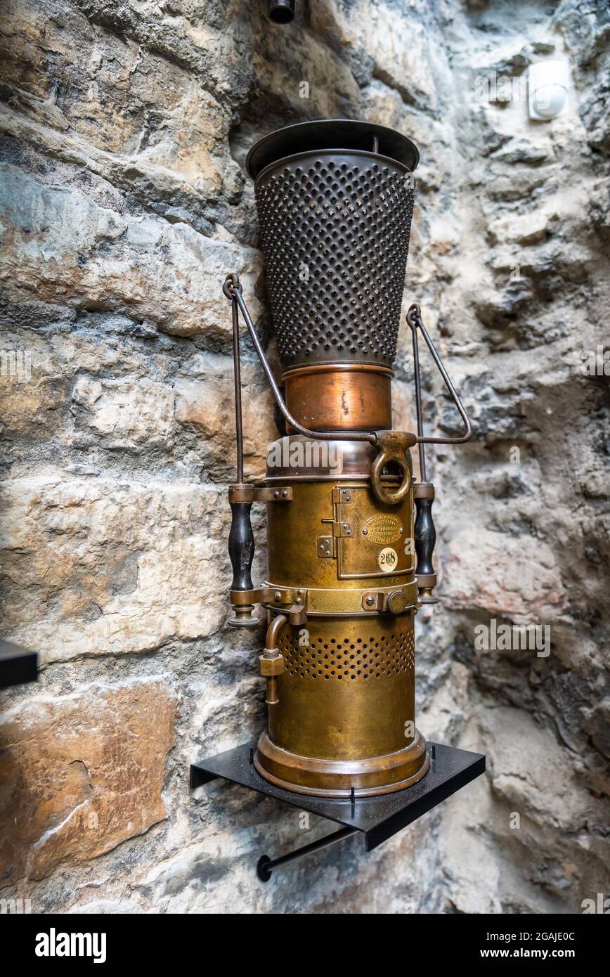Old ship bronze lantern hanging on the wall Stock Photo - Alamy