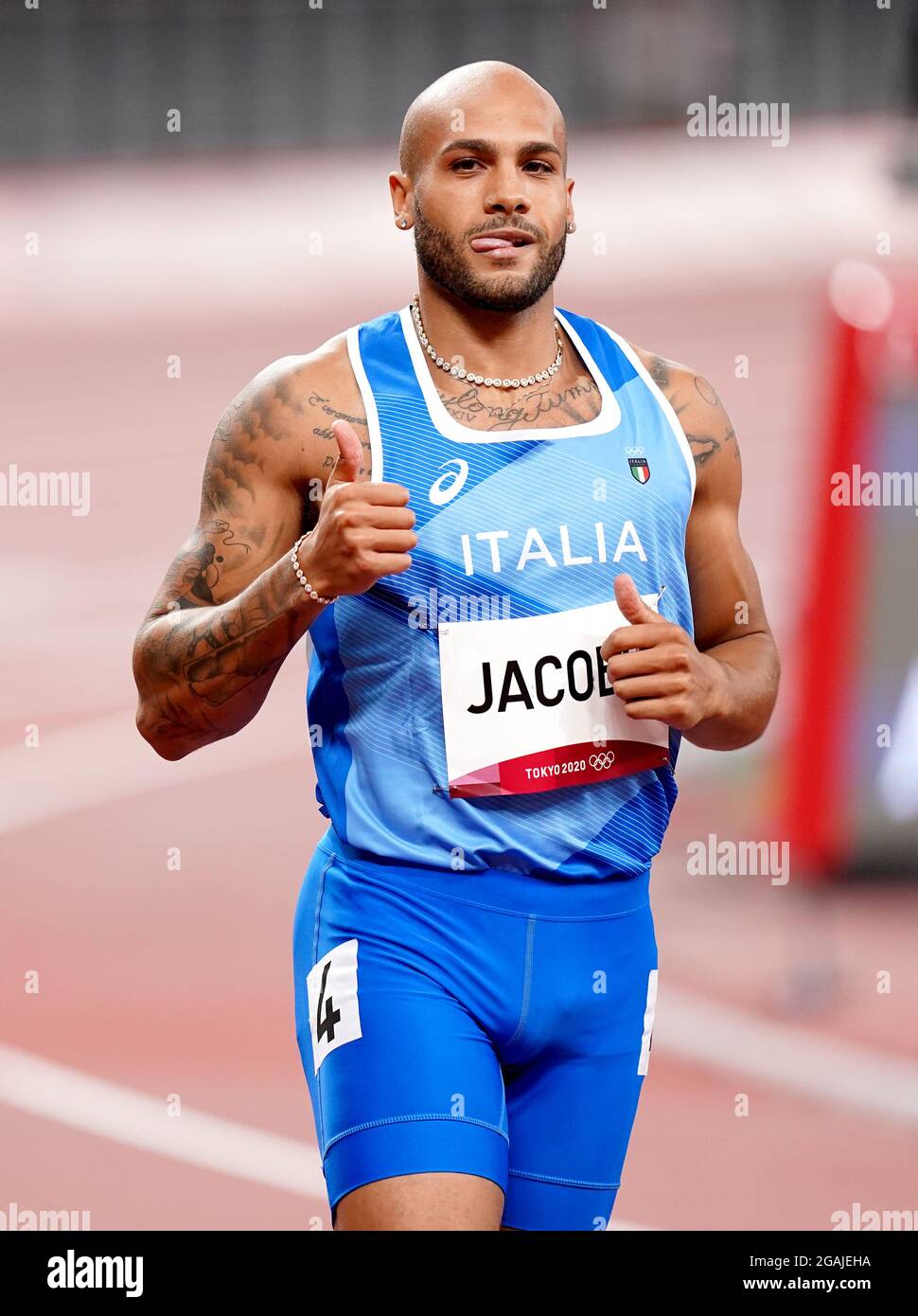 Italy's Marcell Jacobs after winning the third heat of the Men's 100 ...