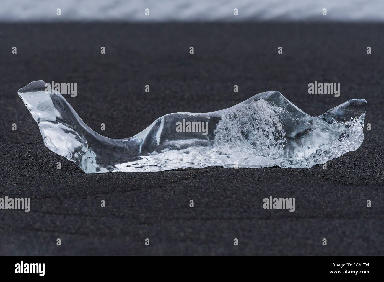 Ice block shaped like a fish on Diamond Beach, Jokulsarlon, Iceland ...