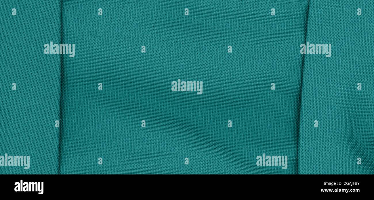 teal green fabric texture useful as a background Stock Photo - Alamy