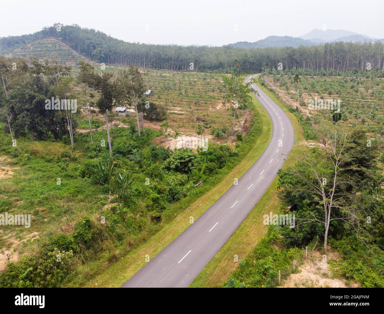 Aerial view of a road surrounded by agricultural fields Stock Photo - Alamy