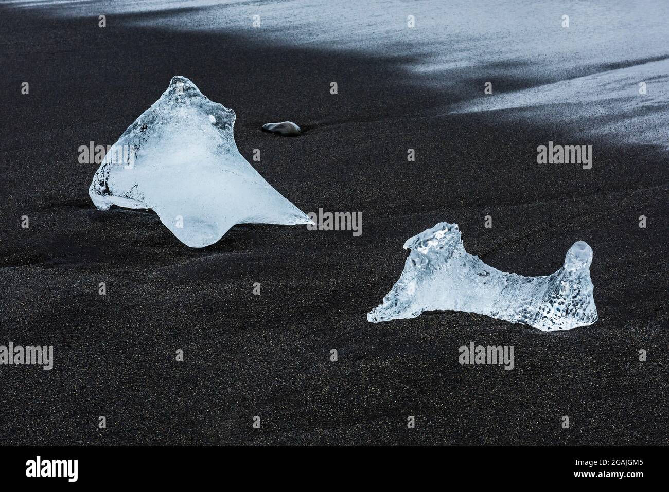 Two ice blocks on Diamond Beach, Jokulsarlon, Iceland Stock Photo - Alamy