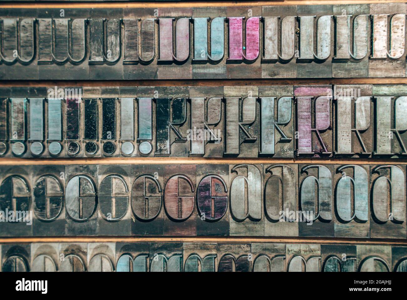 Old typography printing machine with letter samples Stock Photo - Alamy