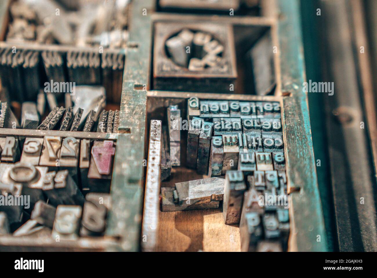 Old typography printing machine with letter samples Stock Photo - Alamy