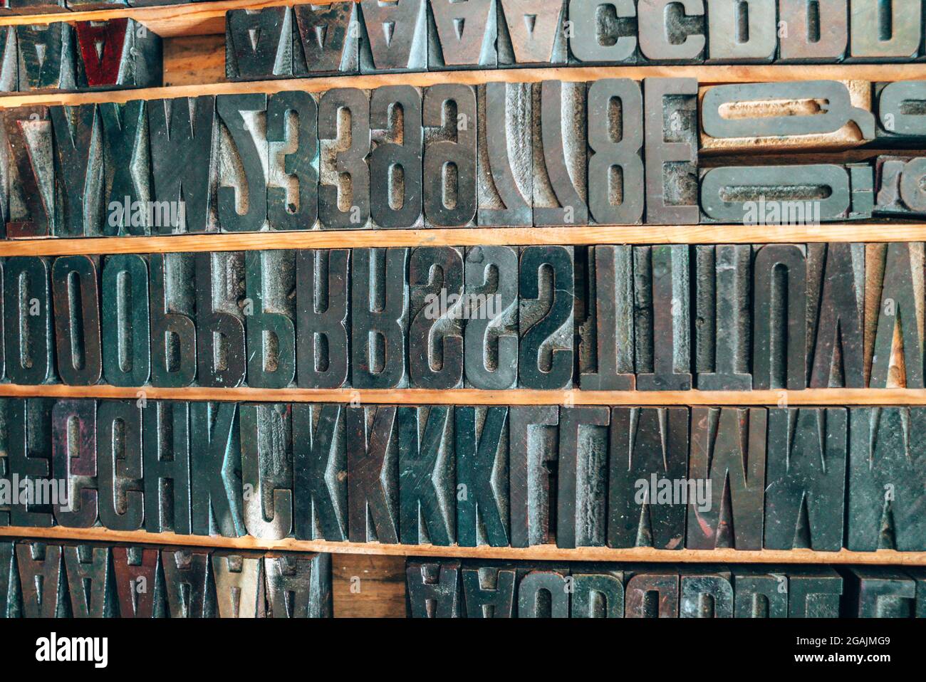 Old typography printing machine with letter samples Stock Photo - Alamy