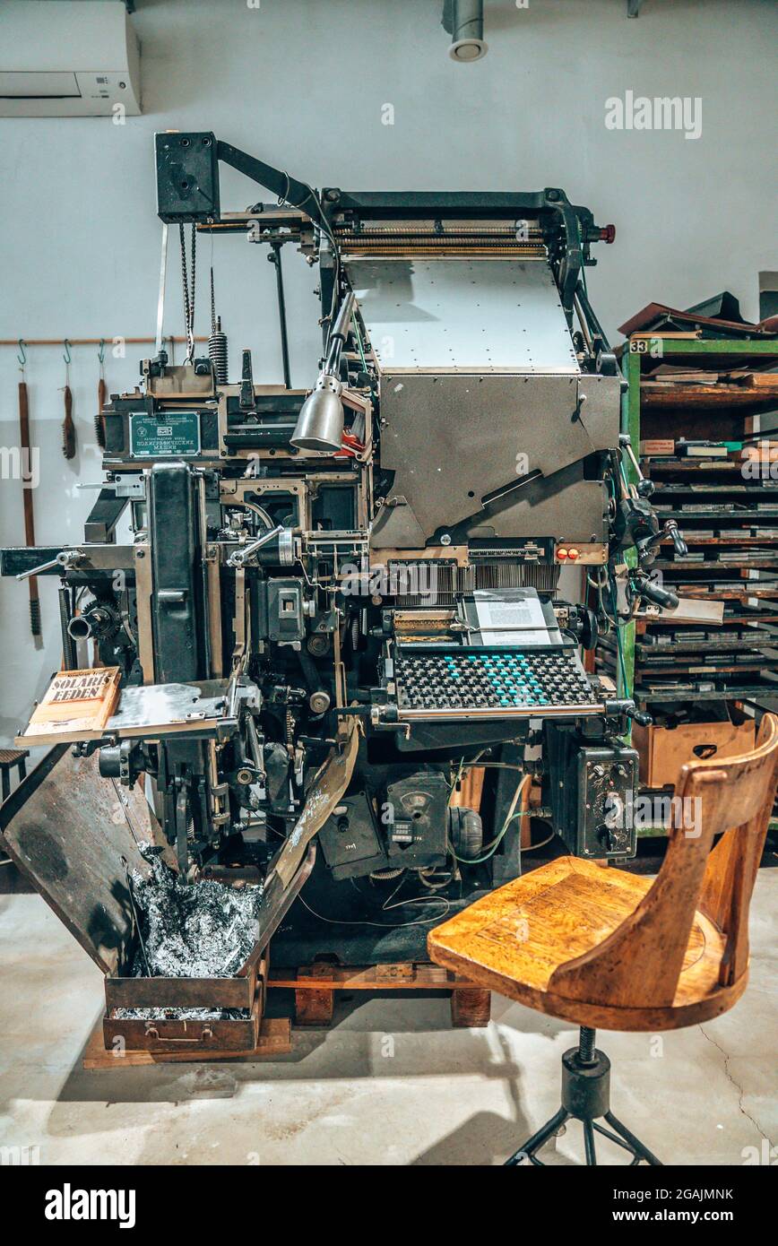 Old typography printing machine with letter samples Stock Photo - Alamy