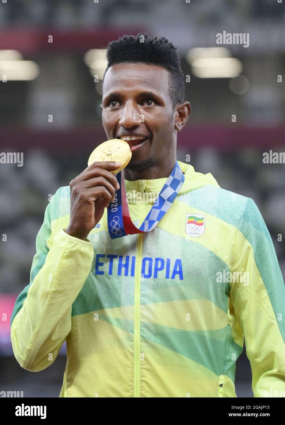 Selemon Barega of Ethiopia poses with the gold medal for the men's ...