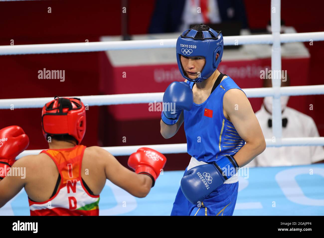 Tokyo, Japan. 31st July, 2021. RANI Pooja (IND) (red) vs LI Qian (CHN ...
