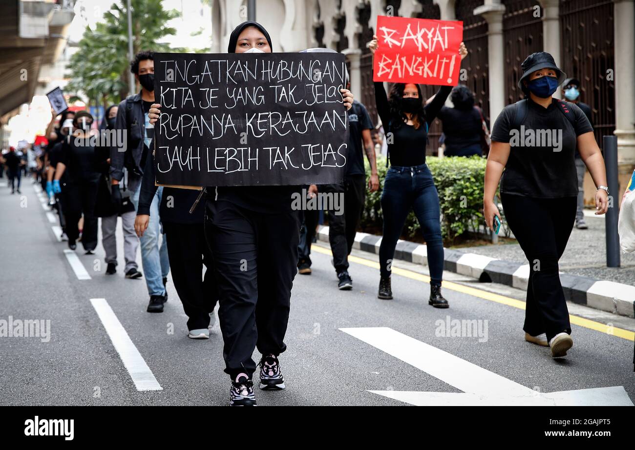 Black clad protesters hi-res stock photography and images - Alamy