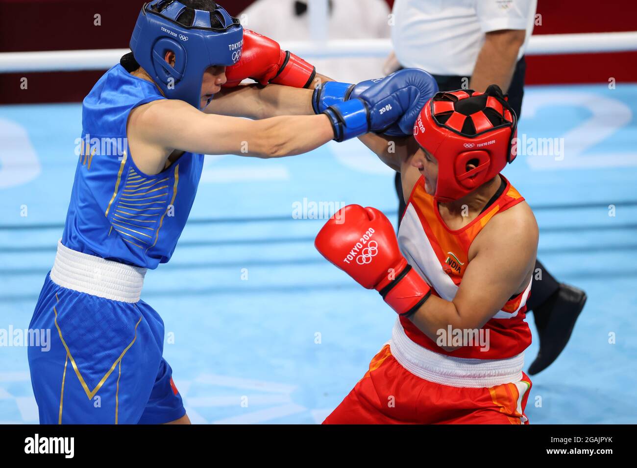 Tokyo, Japan. 31st July, 2021. RANI Pooja (IND) (red) vs LI Qian (CHN ...
