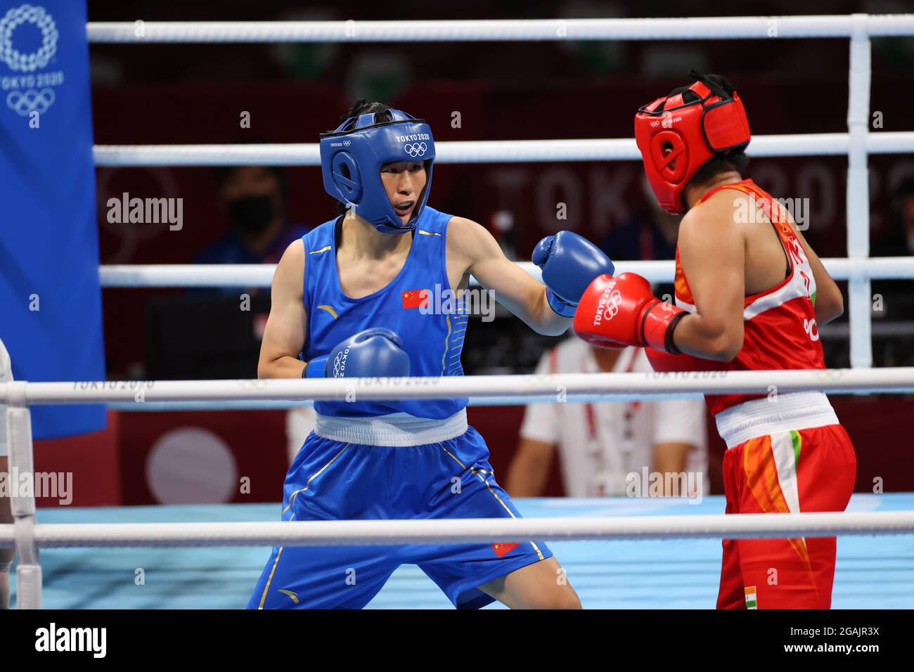 Tokyo, Japan. 31st July, 2021. RANI Pooja (IND) (red) vs LI Qian (CHN ...
