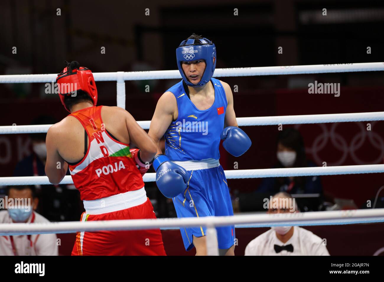 Tokyo, Japan. 31st July, 2021. RANI Pooja (IND) (red) vs LI Qian (CHN ...