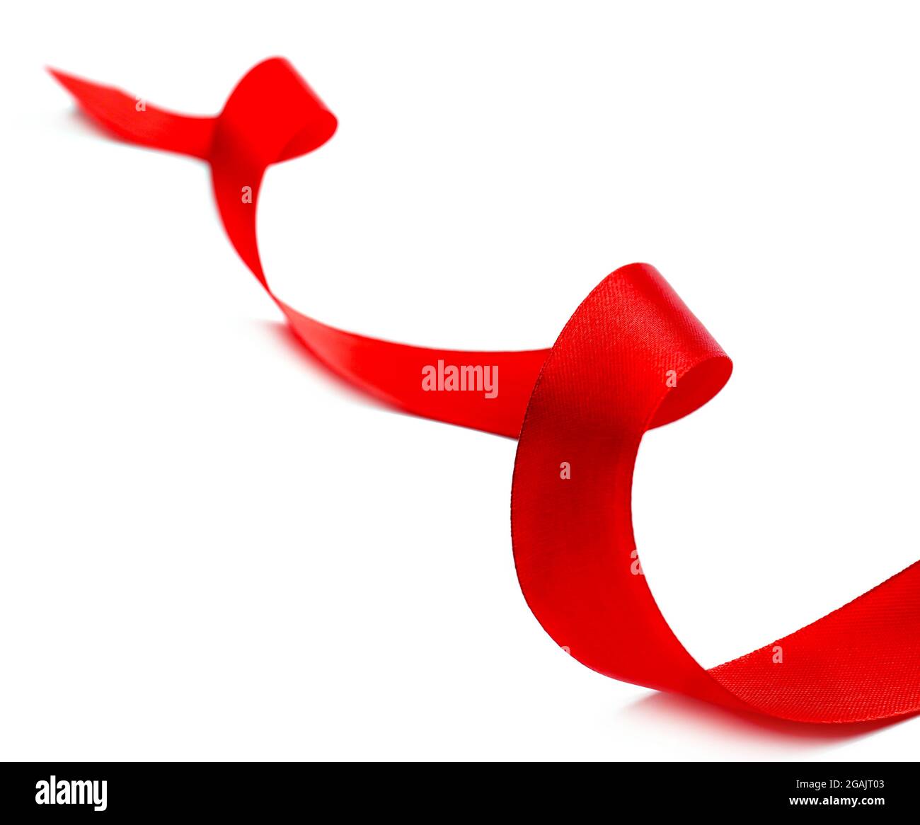 Red ribbon isolated on white Stock Photo - Alamy