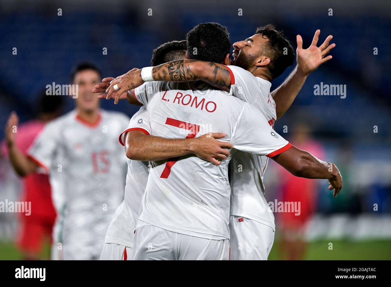 YOKOHAMA, JAPAN - JULY 31: Luis Romo of Mexico celebrates with his team ...