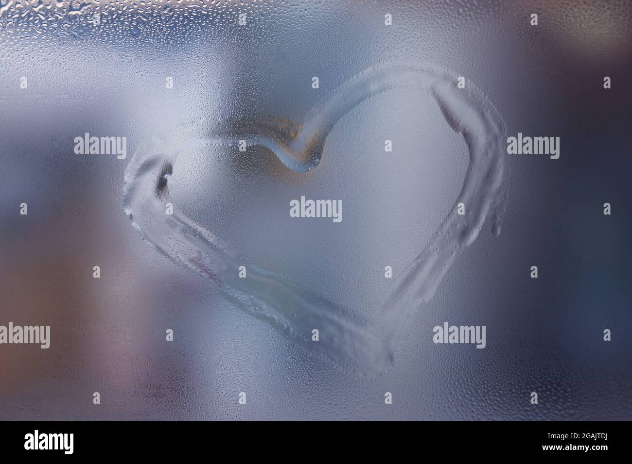 Heart drawn on the fogged glass window Stock Photo - Alamy