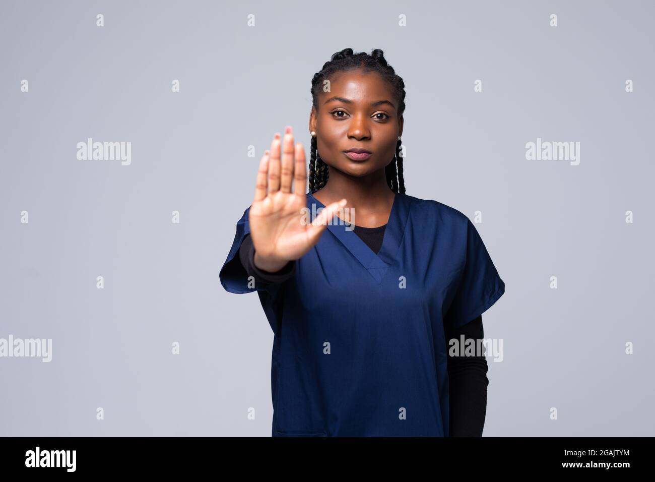 Young beautiful African American doctor woman doing stop gesture with ...