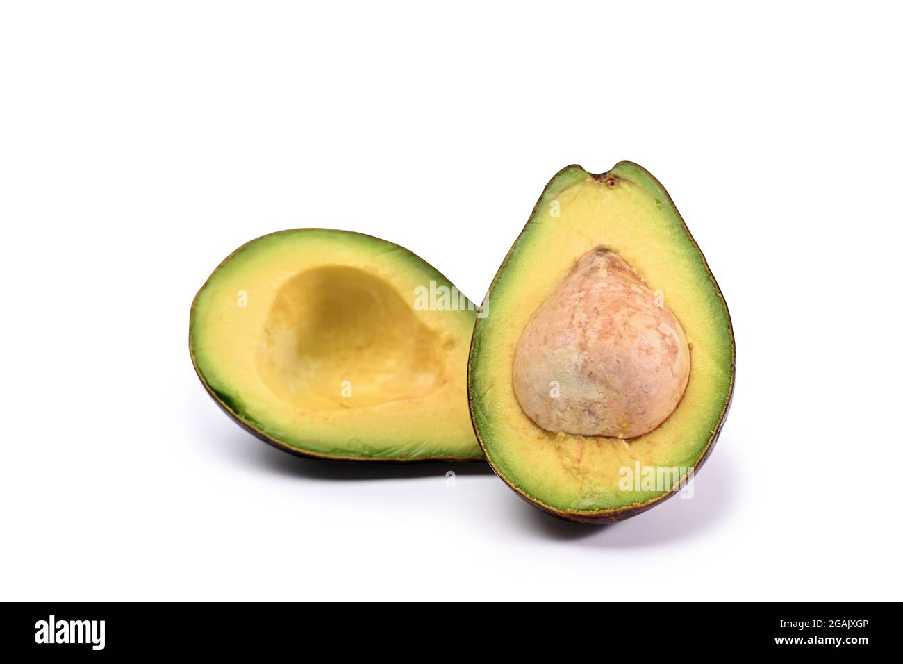 Half avocado isolated on white background Stock Photo - Alamy