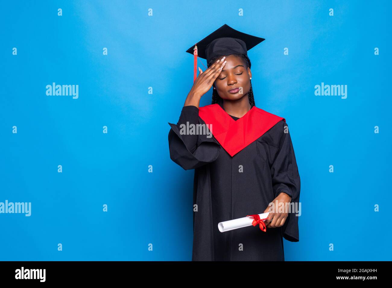African unhappy sad student woman graduating isolated on white ...