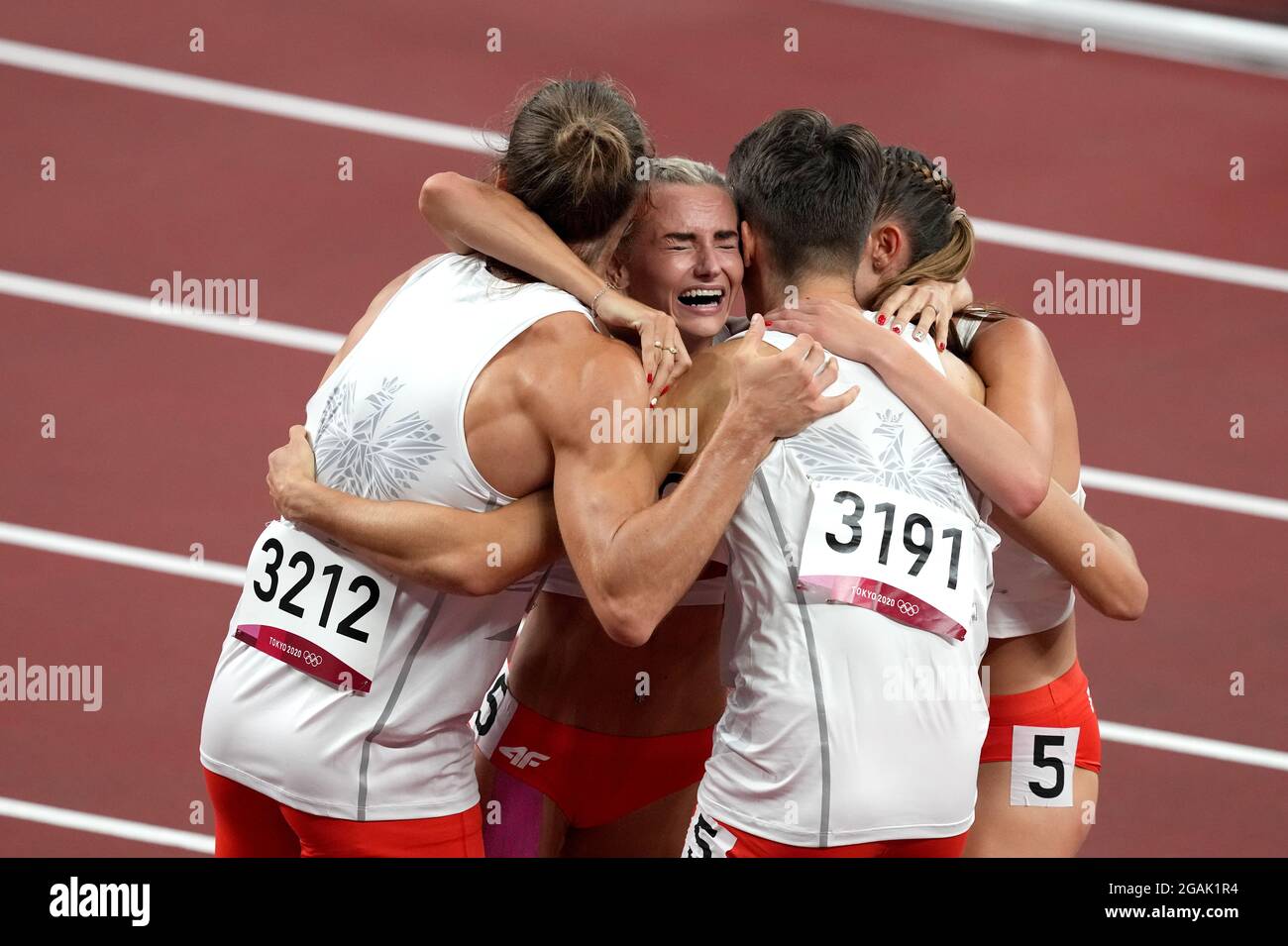 Poland celebrate winning the 4x400 metres Mixed Relay at Olympic ...