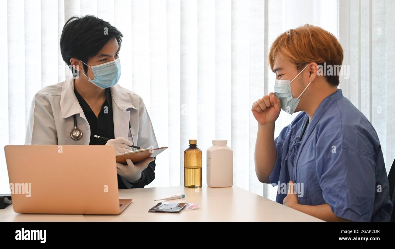 Practitioner doctor giving consultation and explaining medical ...