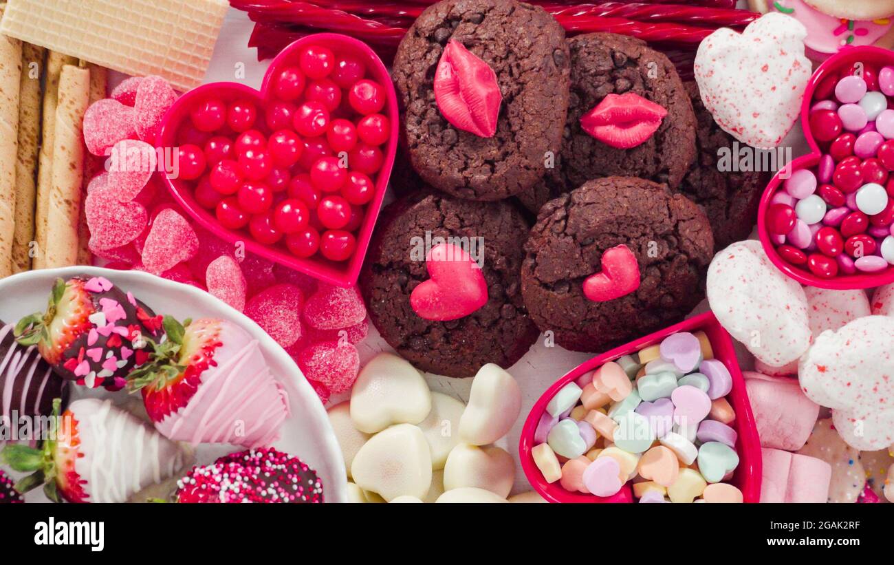 Flat lay. Step by step. Cheese board with candies and cookies for ...