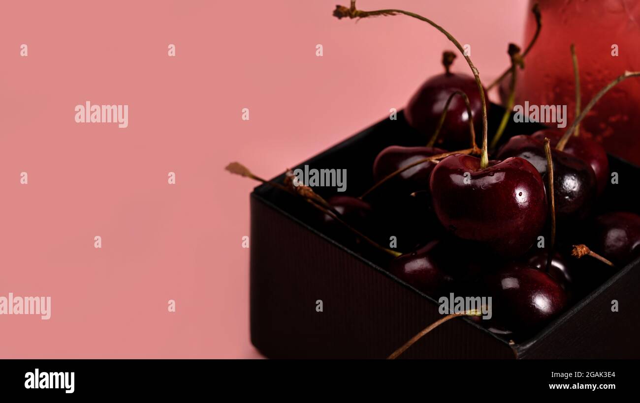 Close up fresh cherries in a box Stock Photo - Alamy