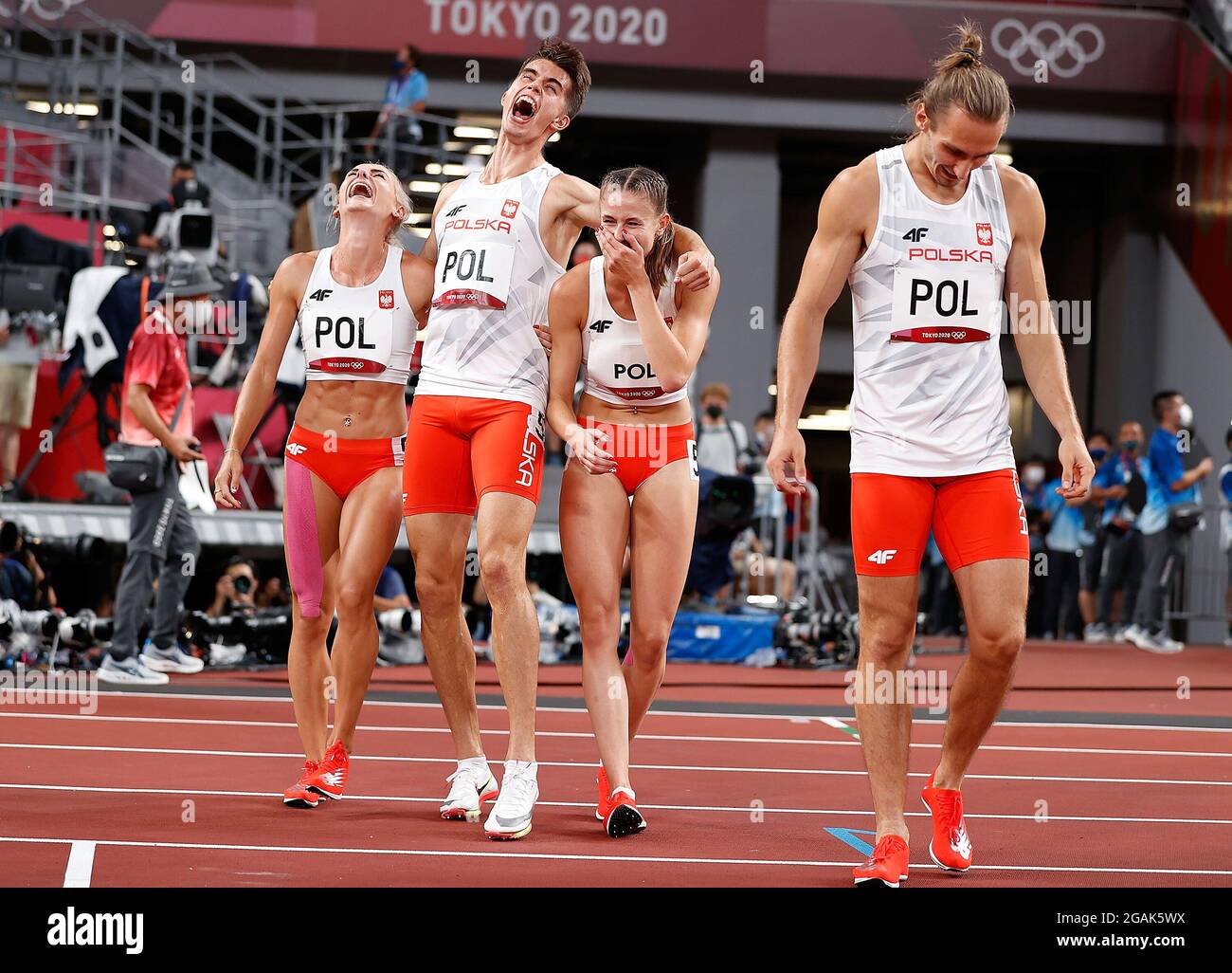 Tokyo, Japan. 31st July, 2021. Members of Team Poland celebrate after ...