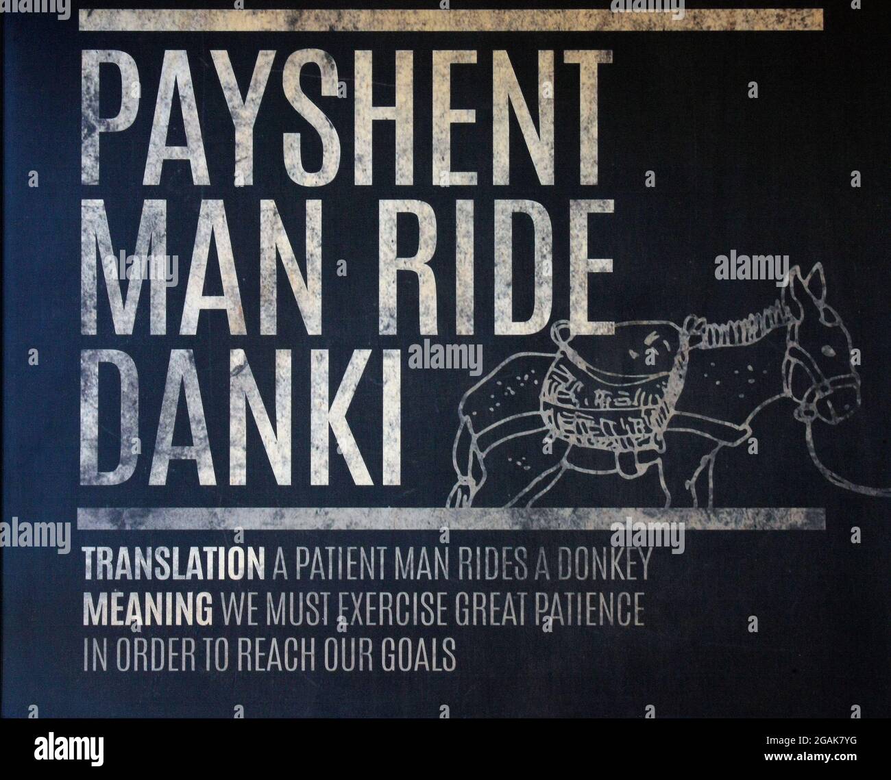 Jamaican Proverb Payshent Man Ride Donkey Stock Photo - Alamy