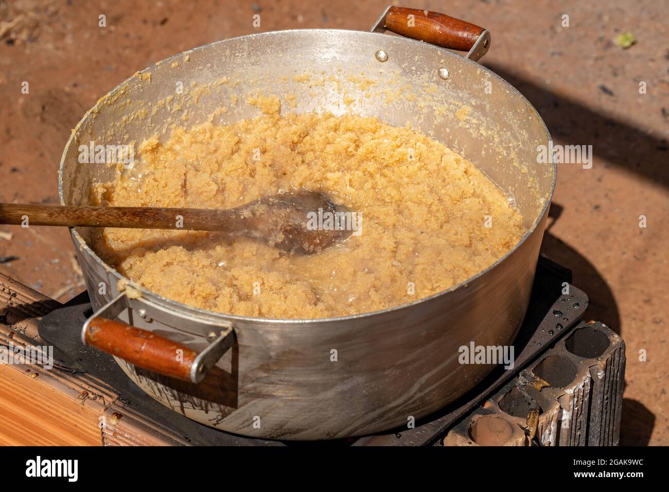 Artisanal sweet production in improvised wood stove Stock Photo - Alamy