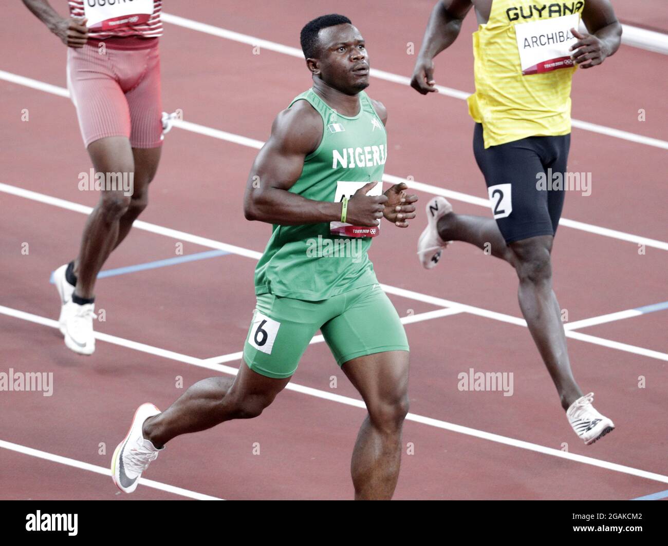 Tokyo, Japan. 31st July, 2021. Nigeria's Enoch Adegoke (C) 9.98, a ...