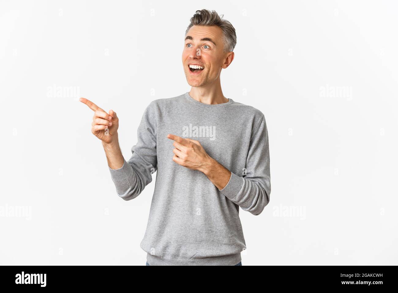Image of happy and amazed handsome man with grey short hairstyle ...