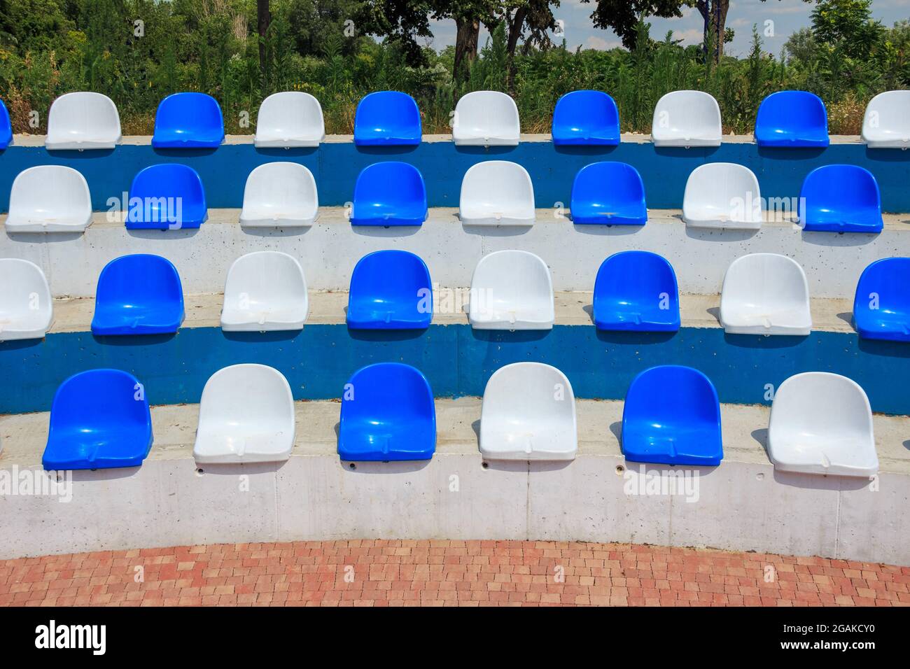 Empty stadium chairs in blue and white colors Stock Photo - Alamy