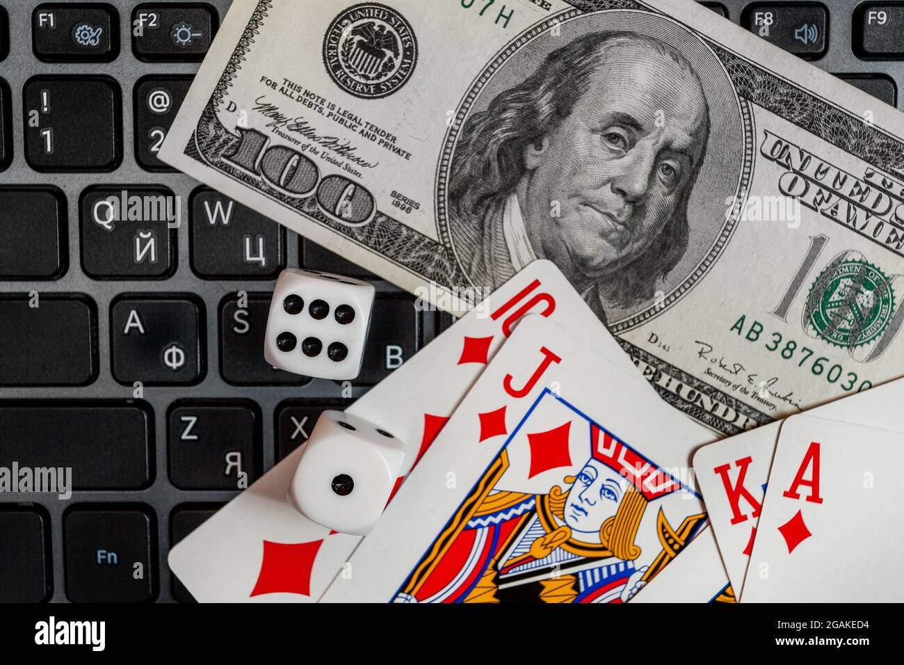 Chisinau, Moldova - 20. 12. 2020 dice, playing cards on laptop keyboard ...