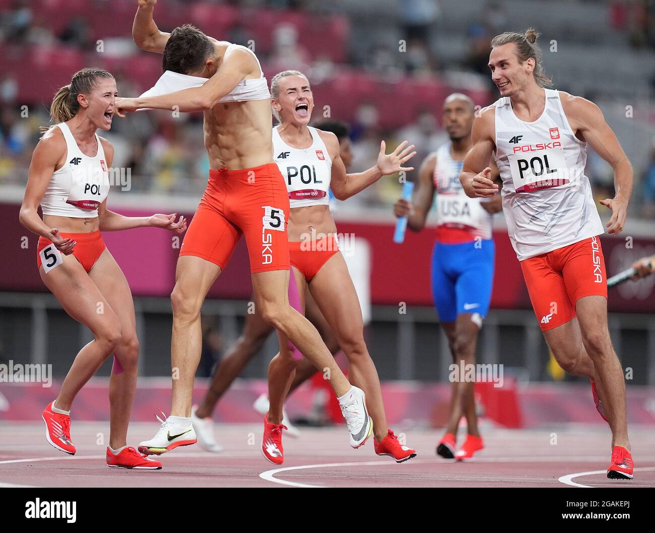 Tokyo, Japan. 31st July, 2021. Members of Team Poland celebrate after ...