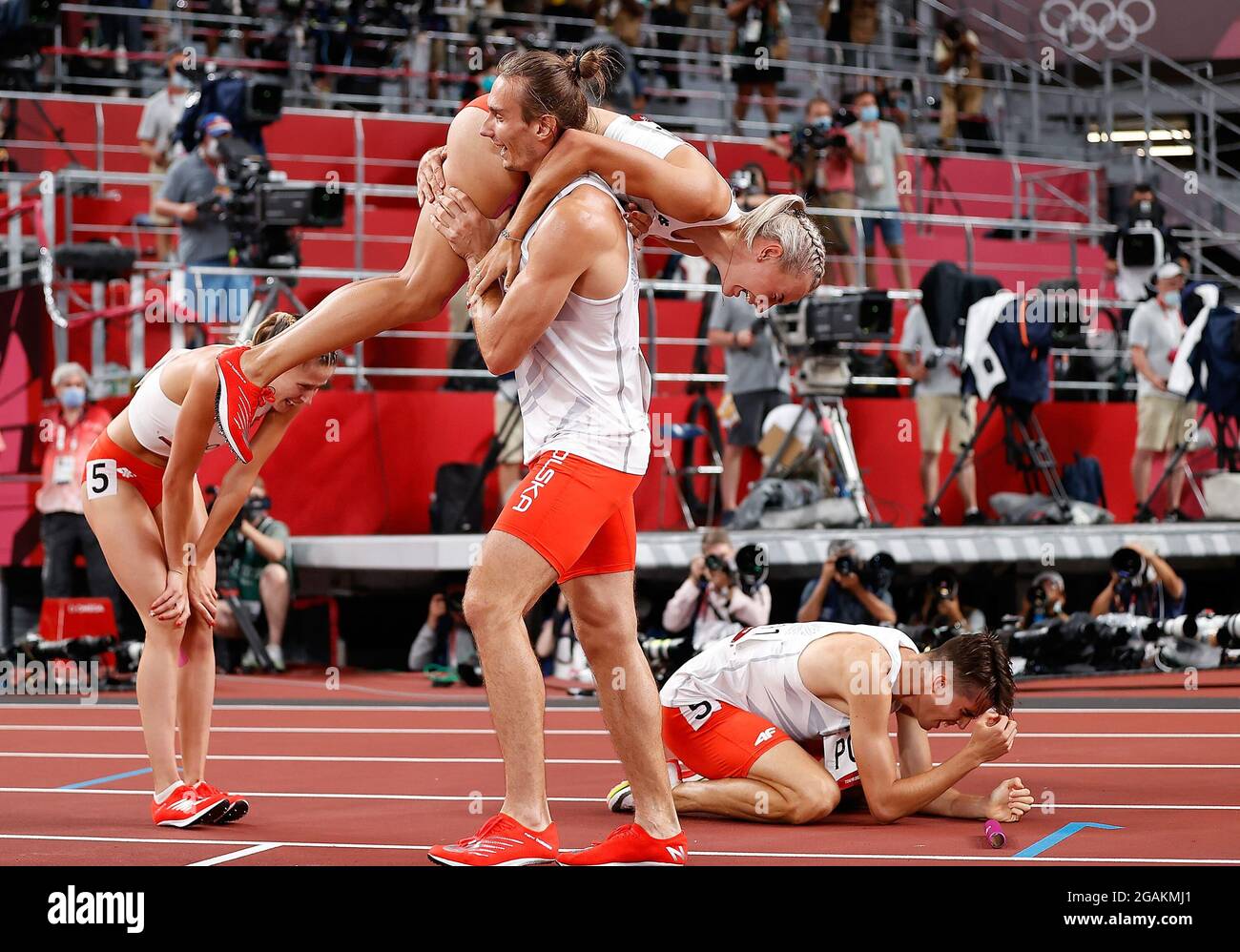 Tokyo, Japan. 31st July, 2021. Members of Team Poland celebrate after ...