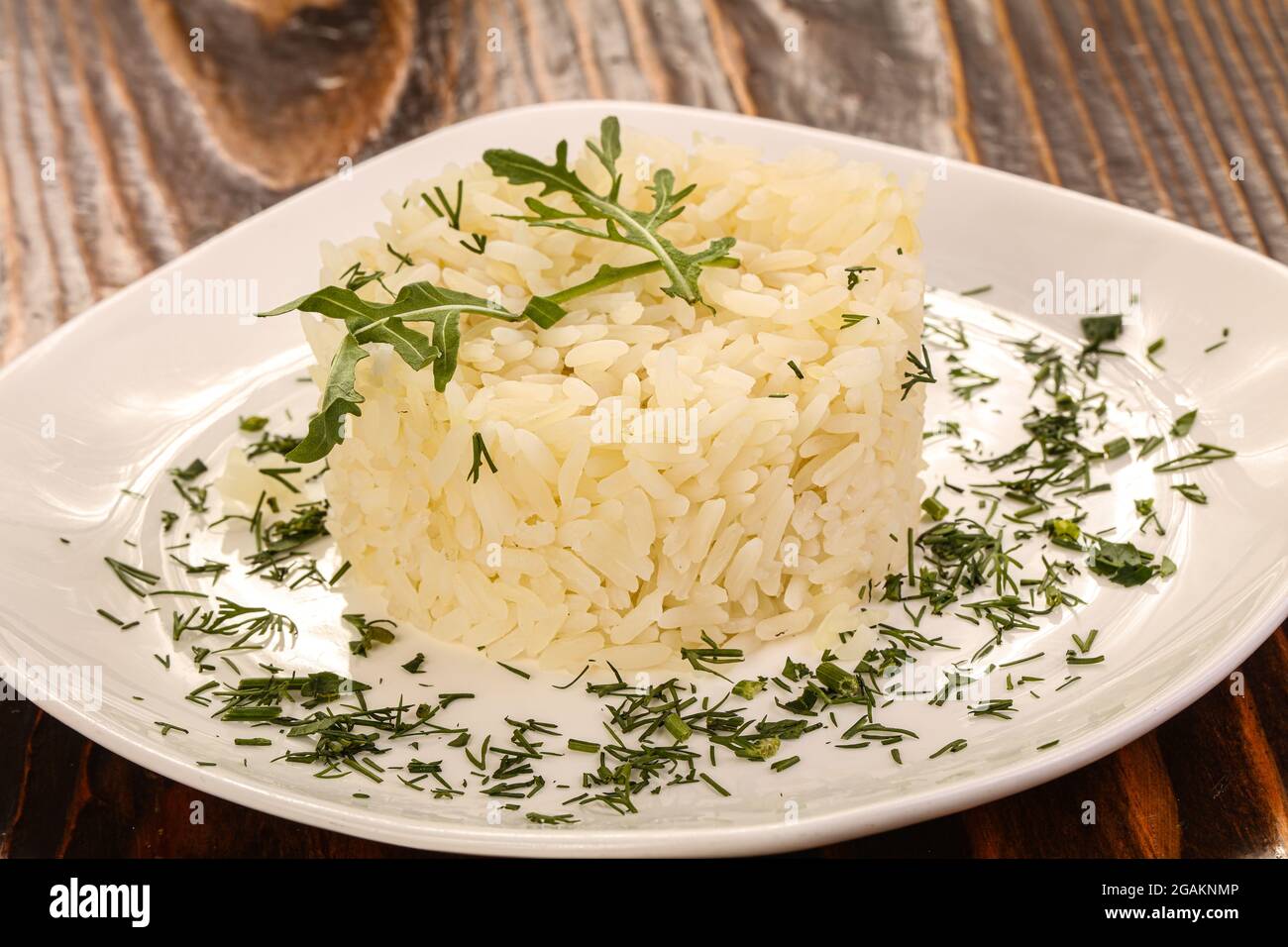 Steamed rice served green herbs in the plate Stock Photo - Alamy