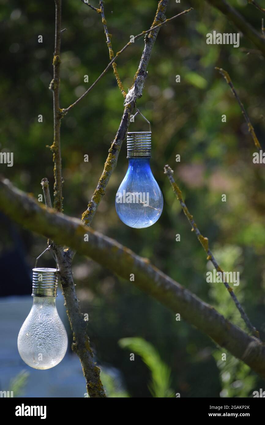 blue and white Solar light bulb outdoors Stock Photo - Alamy