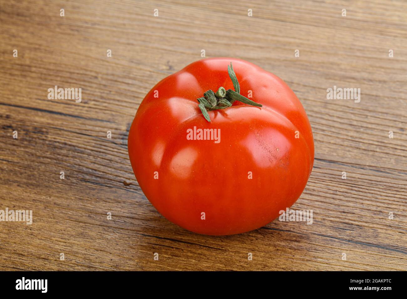 Red ripe big juicy tomato isolated Stock Photo - Alamy