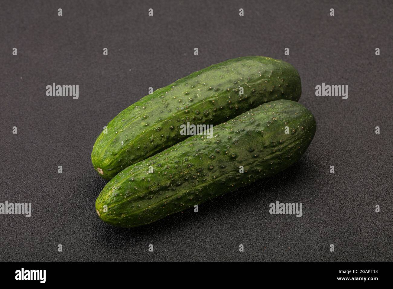Ripe organic natural green cucumber isolated Stock Photo - Alamy