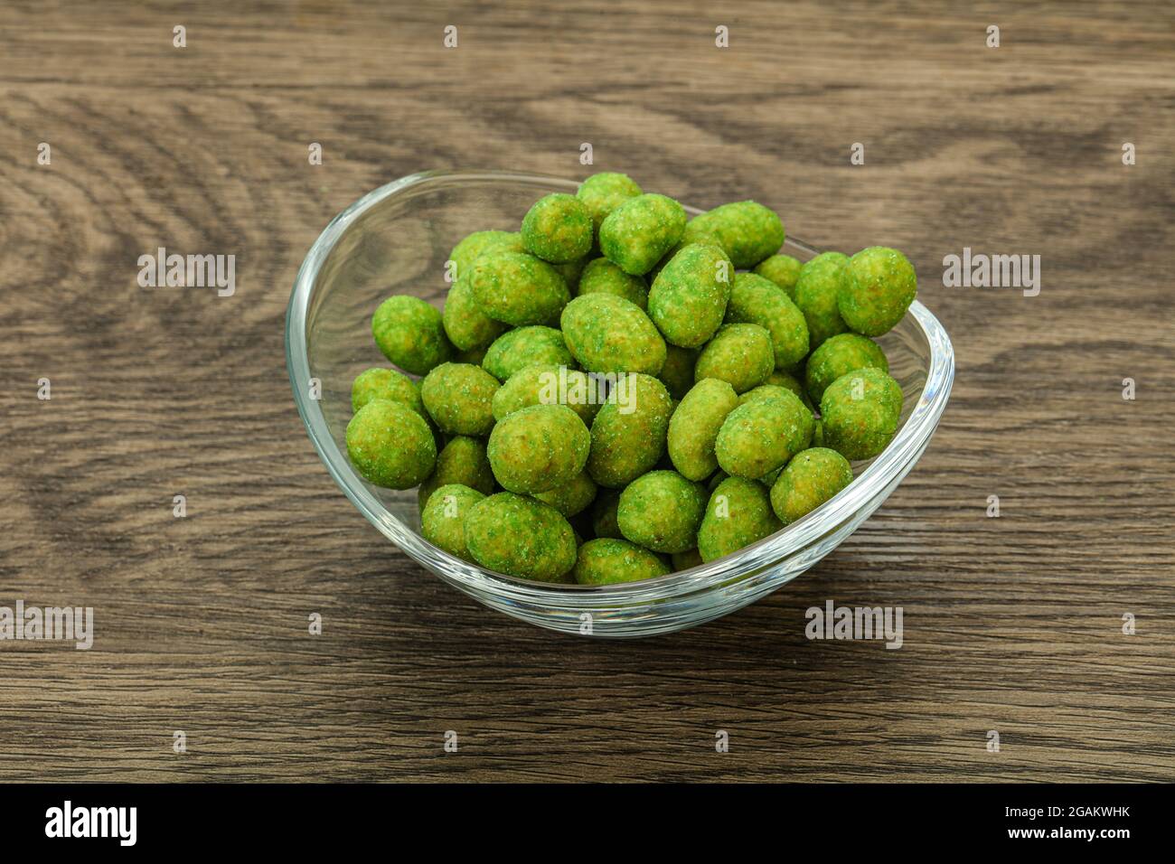 Spicy wasabi peanuts snack in the bowl Stock Photo - Alamy