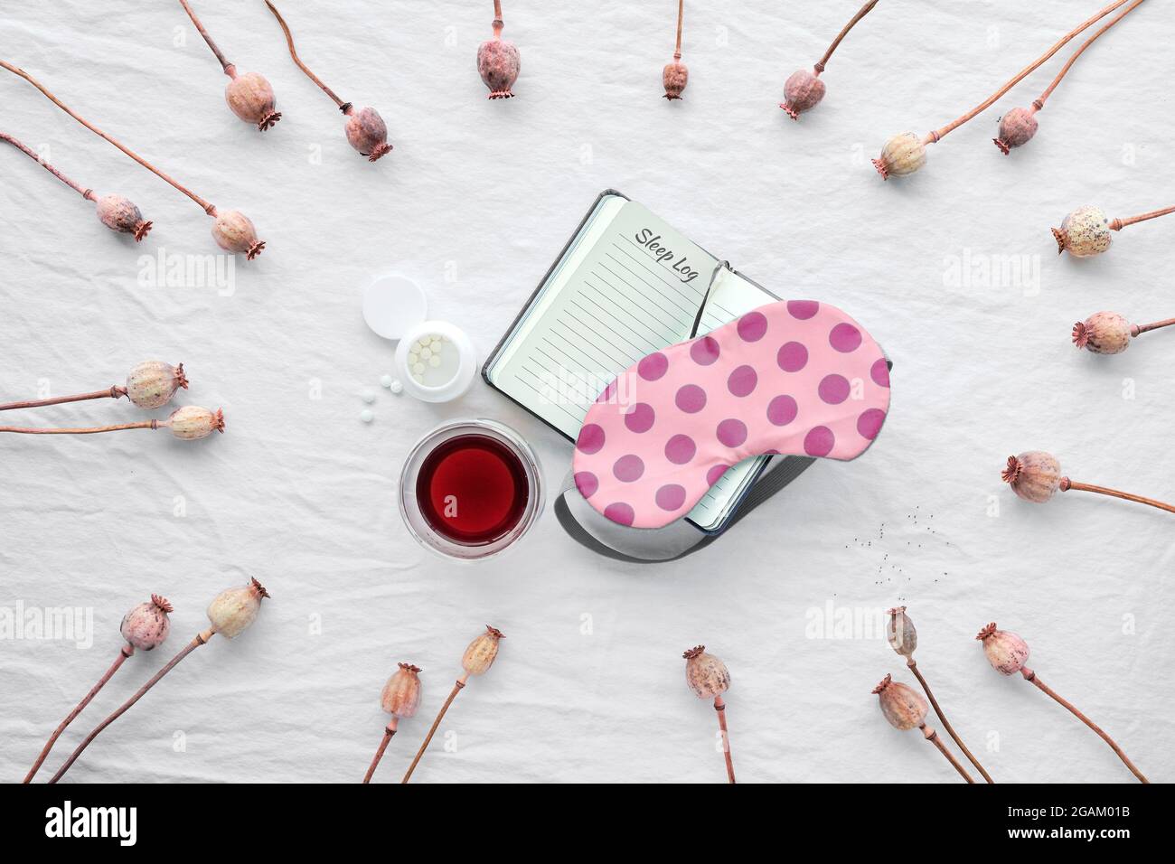 Healthy night sleep flat lay. Orange sleep mask with brown polka dots ...