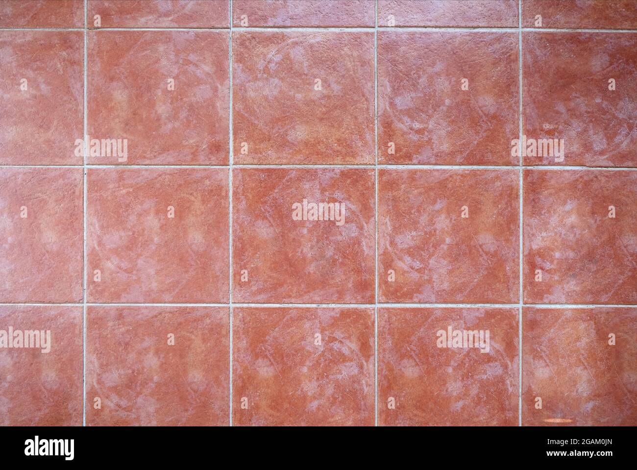 Brown floor tiles background Stock Photo - Alamy