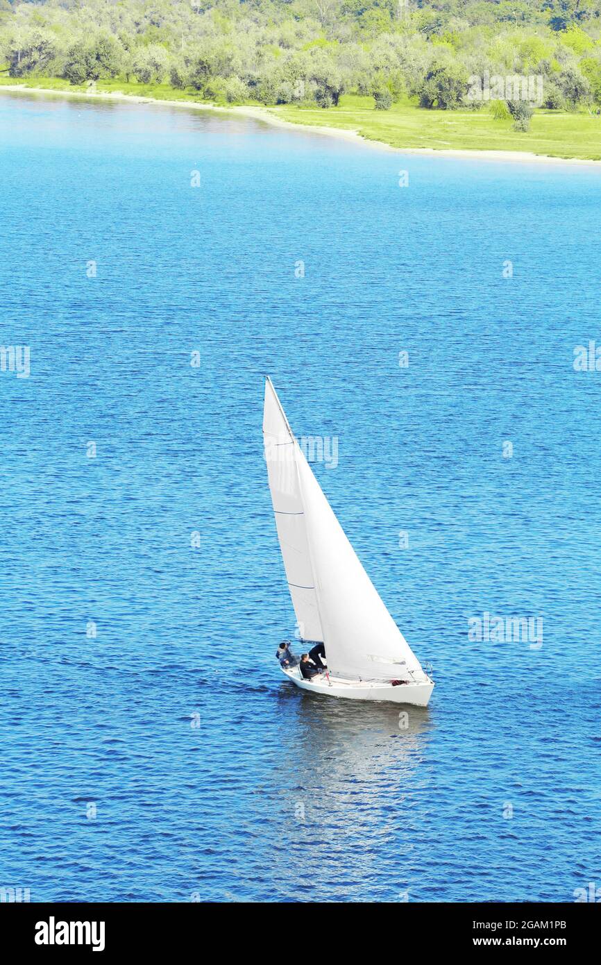 Sailing yacht on river Stock Photo - Alamy